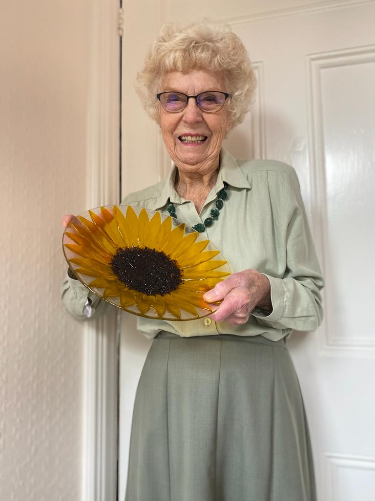 Founding Member and longstanding contributor, Marion Wallwork, stands ...
